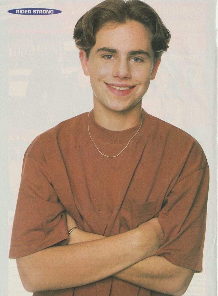Rider Strong teen magazine pinup clipping orange shirt young modeling ...